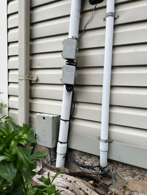 Best way to waterproof hole for electrical wires in exterior concrete