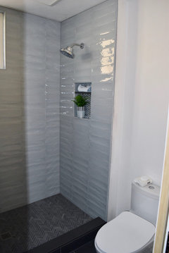 What is the correct way to finish our shower tile edges