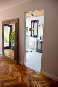 Chipped tile at door threshold in new bathroom. What to do?