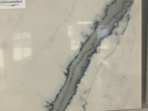 Difiniti Onda Grigia or Cambria Sutherland Quartz. Please help!