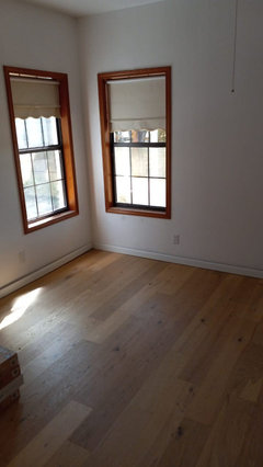 Stained wood baseboard/trim to match floors or painted base?