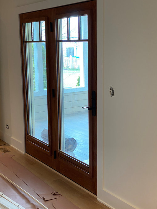 Need a quick decision: White or stained bottom trim for the door?