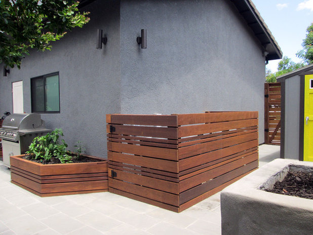 12 Enclosure Ideas for Trash Bins, Compost Piles and AC Units