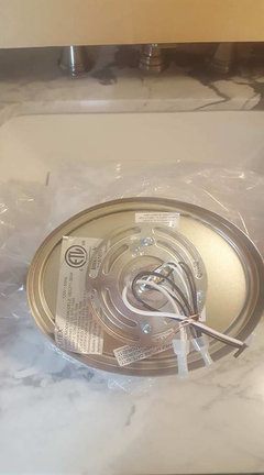 Need help with vanity light/junction box not centered.