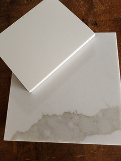 Considering Terra Sol Quartz and Greek Villa Cabinets.