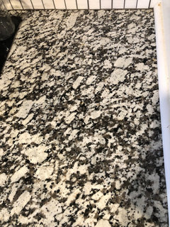 Outdated granite and backsplash. Best option for cabinet color?