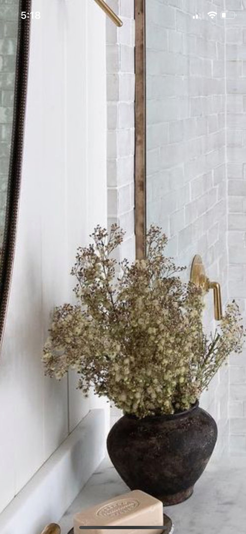 Does anyone have any tips on doing a mitred tile edge around a window?