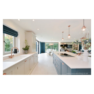 Large open-plan modern kitchen with full length handmade cupboards ...