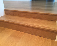 Square or round edging on hardwood stairs?