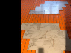 Large tile .. 12 x 24....1/3 offset.