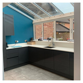 Bright L shape kitchen with large windows - Contemporary - Kitchen - by ...