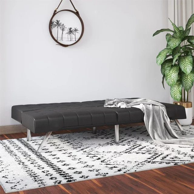 Convertible Black Faux Leather Futon Sofa with Chrome Legs and Tufted ...