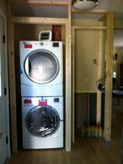 Help me with my vertical stacked laundry in a great room!