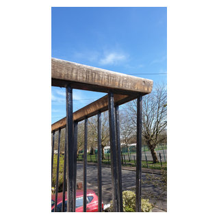 Front exterior - garage door, hand rail, and railing in West Wimbledon ...