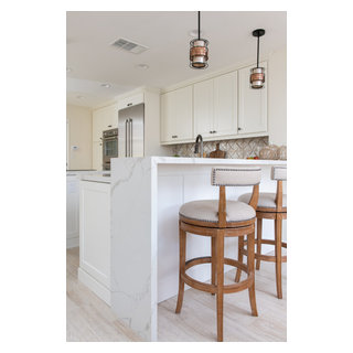 Waterfall two-tiered countertop in kitchen remodel - Transitional ...