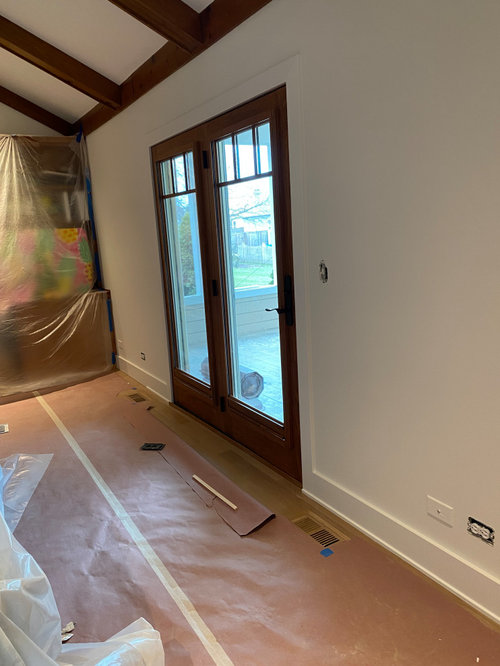 Need a quick decision: White or stained bottom trim for the door?