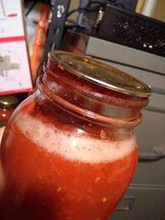 Home Canned tomatoes with Foaming Bubbles