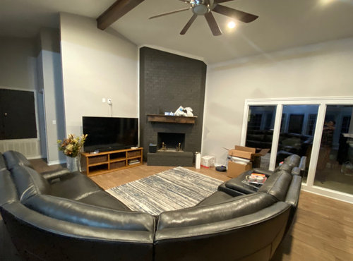 rug placement with diagonal fireplace