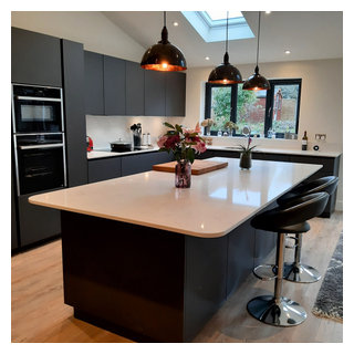 A large quartz topped island provides lots of space to work ...