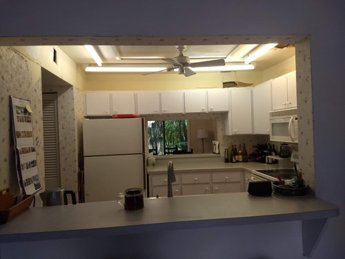 ISO photos of a standard fridge in a niche with a wall on both sides ...