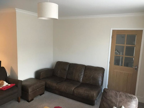 Decor and colour help to modernise drab living room