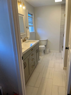 Toilet and shower behind a door