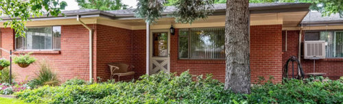 Exterior garage door infill for garage conversion