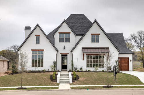 Updating 1990s house with new siding, windows and entryway
