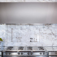 quartzite wrapped range hood?