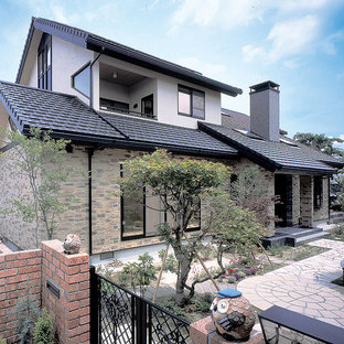 75 Beautiful Asian Brick Exterior Home Pictures & Ideas | Houzz