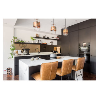 Modern Black Handleless Kitchen With Hidden Pantry and Ceramic Worktops ...