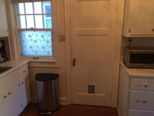 Help! Awkward kitchen with four doorways and poorly placed window.