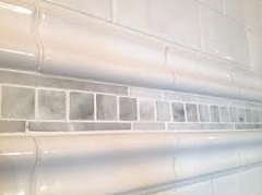 Accent strip with 3x6 white subway tile laid in herringbone pattern?