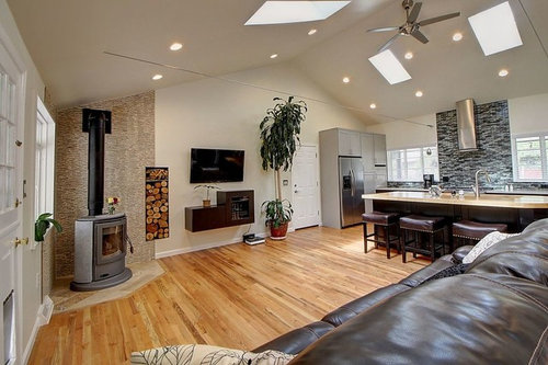 Ideas for visually balancing this huge vaulted wall?