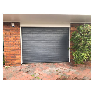 Sectional garage door, New Lynn - Contemporary - Garage - Auckland - by ...