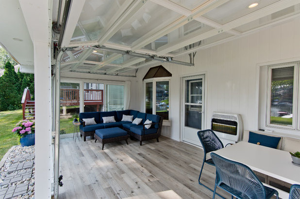Glass-Paneled Garage Doors Open Up a New Sunroom