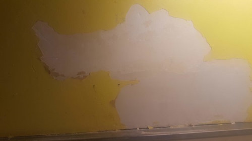Applying peel and stick backsplash to an uneven surface plaster wall