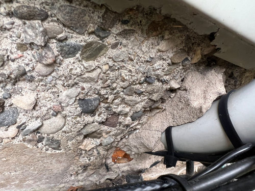 Best way to waterproof hole for electrical wires in exterior concrete