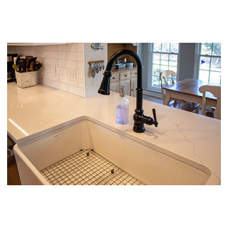 Siteline White Kitchen with Gray Island and Calacatta Miraggio Quartz ...