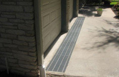 Driveway too steep! Bring driveway to street level & build new garage.