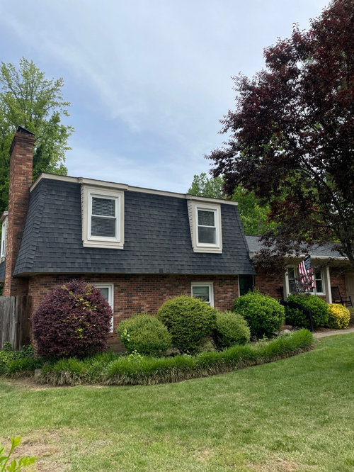 Ideas to improve 70s split level mansard roof exterior?