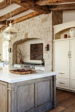How to modernize a kitchen with stone arch over stove?