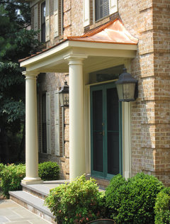 Portico design for a traditional colonial, with recessed door