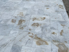 HELP!! Mystery stains on new marble pool deck
