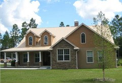 Our home has beige metal roof and need advice on exterior colors