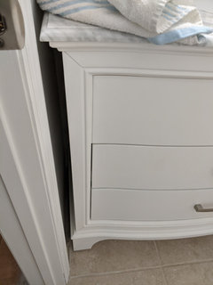 bathroom vanity against the side wall or 2" gap?