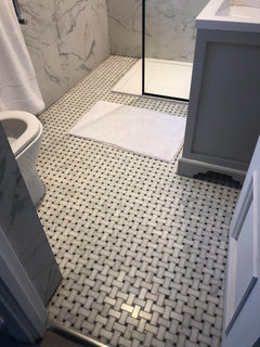 Grout bleeding into marble tiles