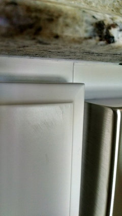 Factory painted kitchen cabinets chip and scratch easily