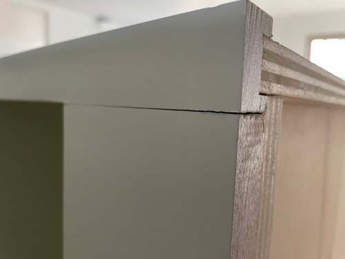 Should I accept those defects on the new kitchen cabinets?