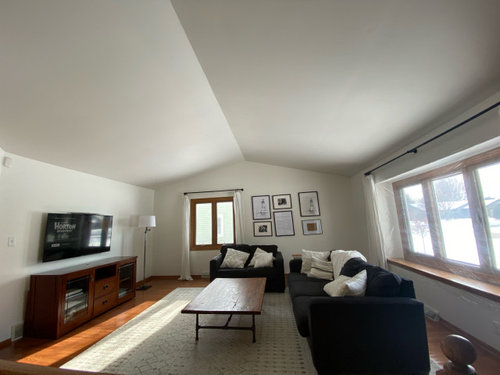 Couch off center of window